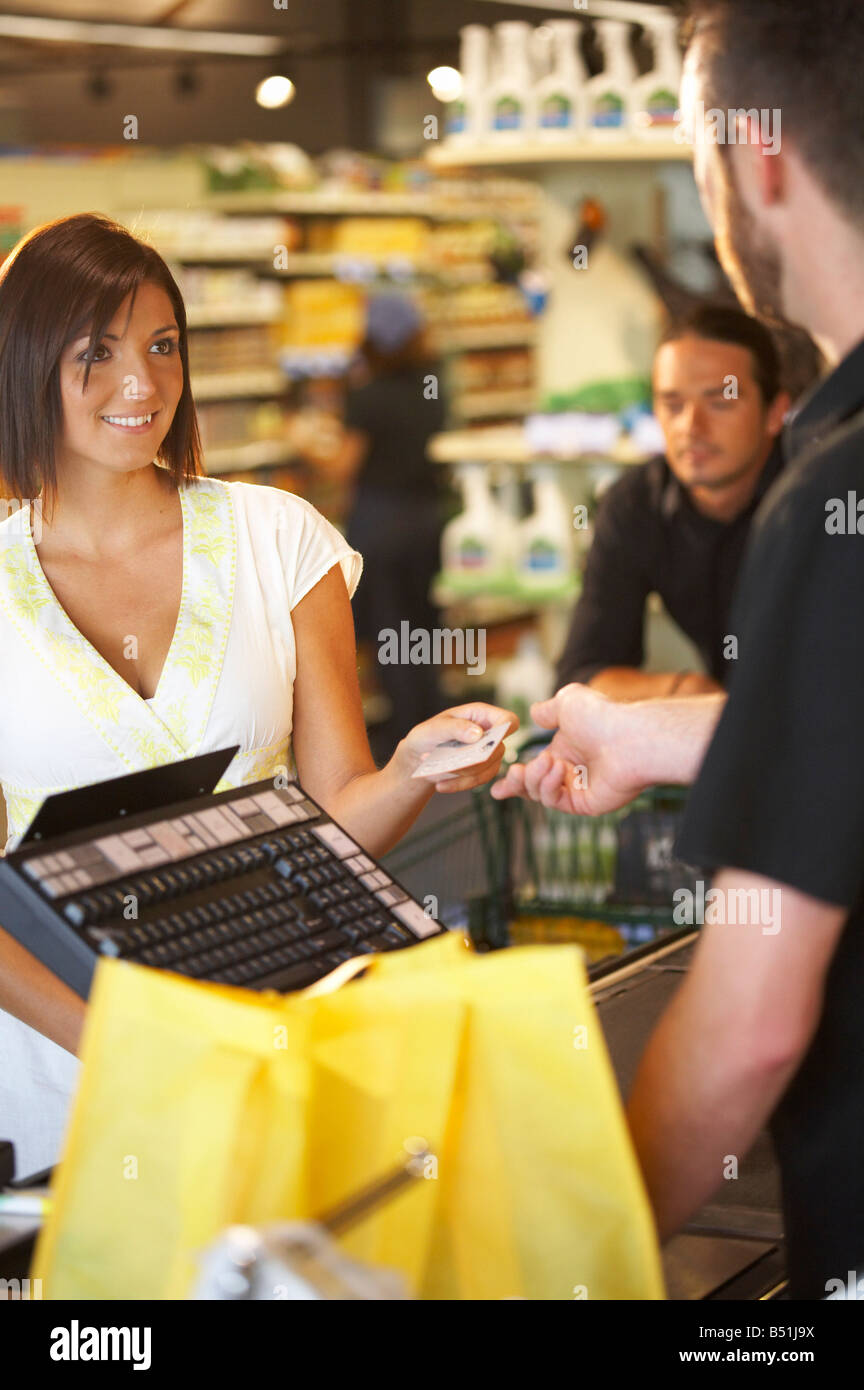 Male cashier grocery bag hi-res stock photography and images - Alamy