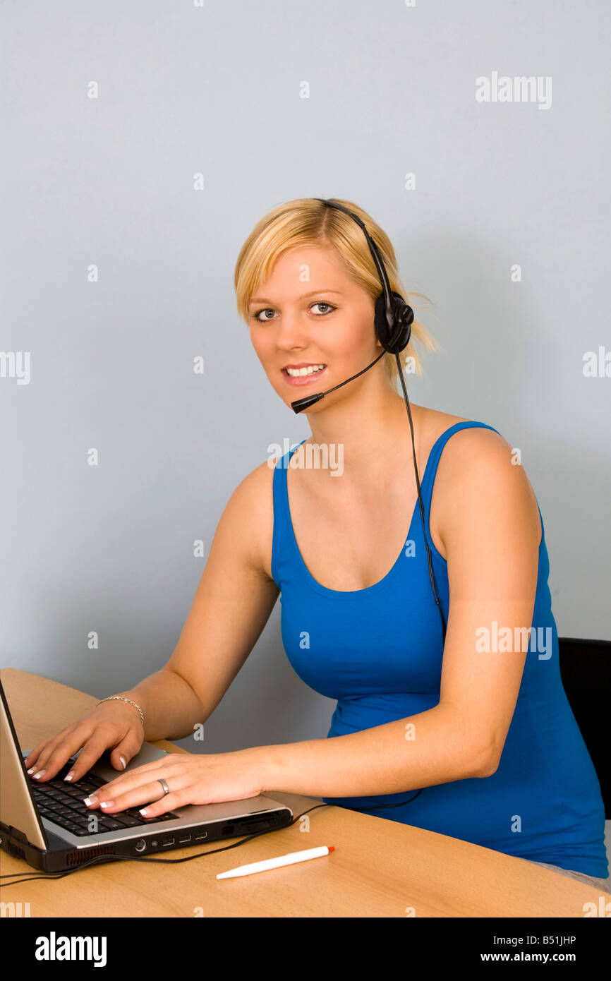 Secretary with blond hair Stock Photo - Alamy