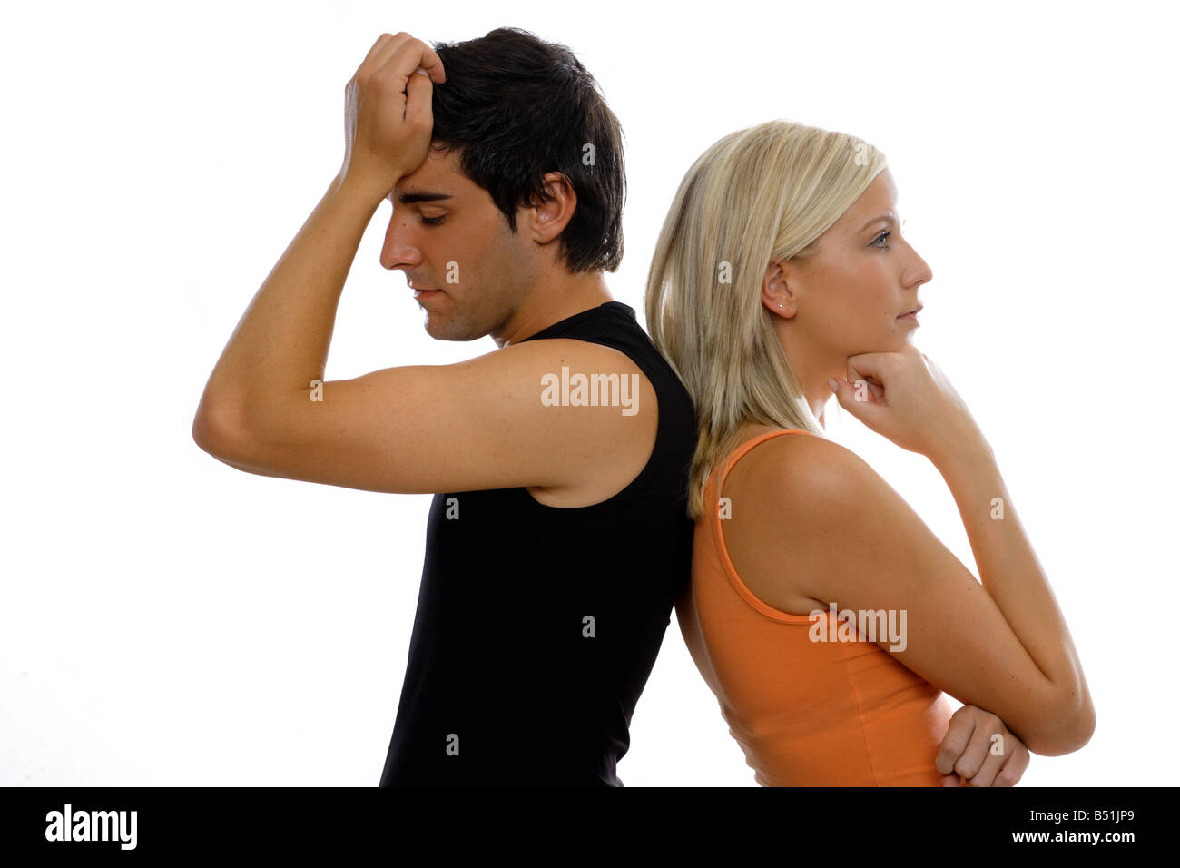 young couple back to back Stock Photo - Alamy
