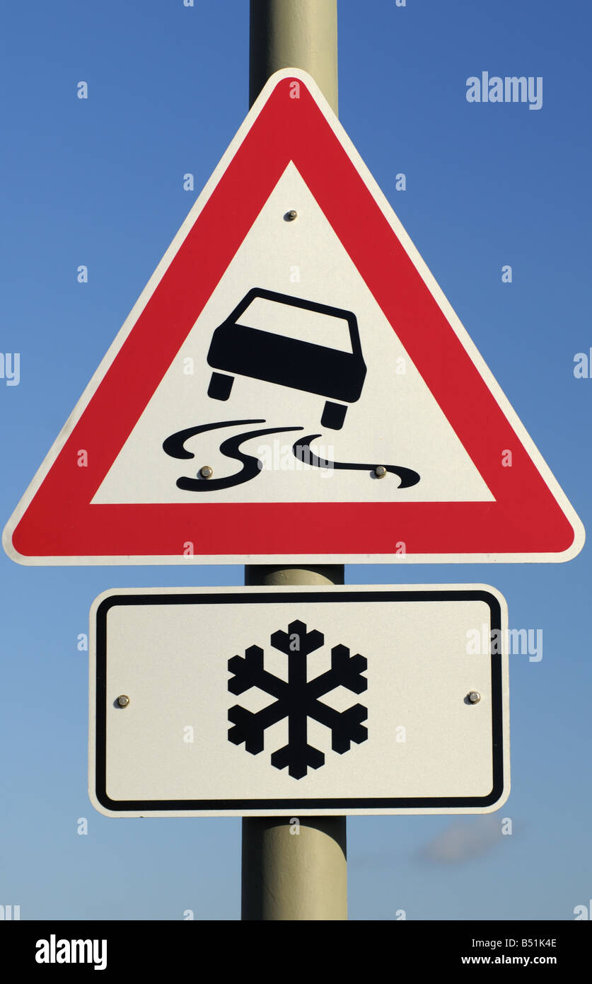 Slippery road surface sign hi-res stock photography and images - Alamy