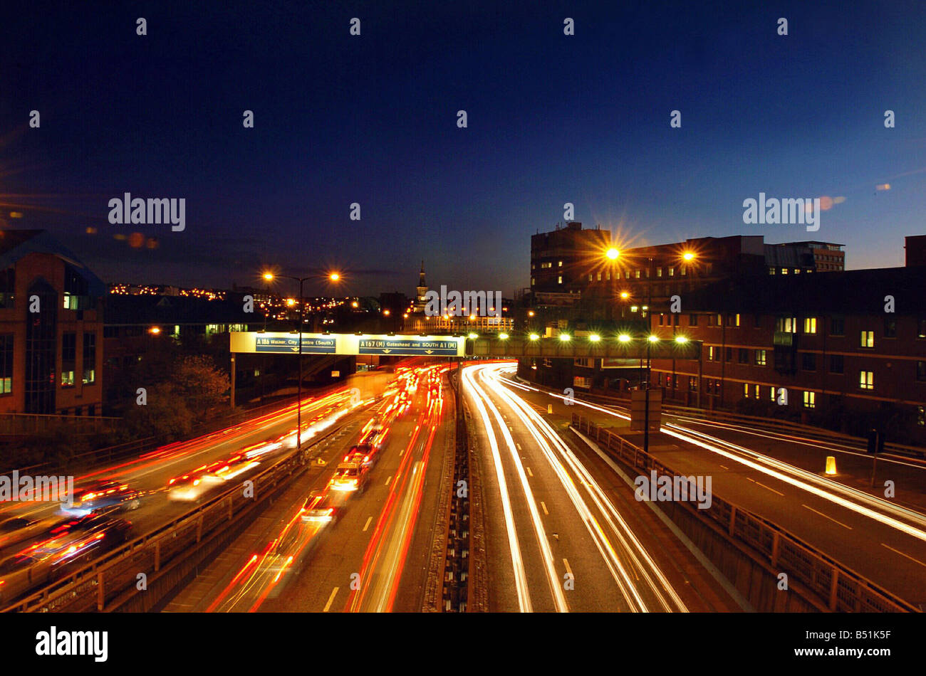Commuter traffic in Newcastle at night Stock Photo - Alamy