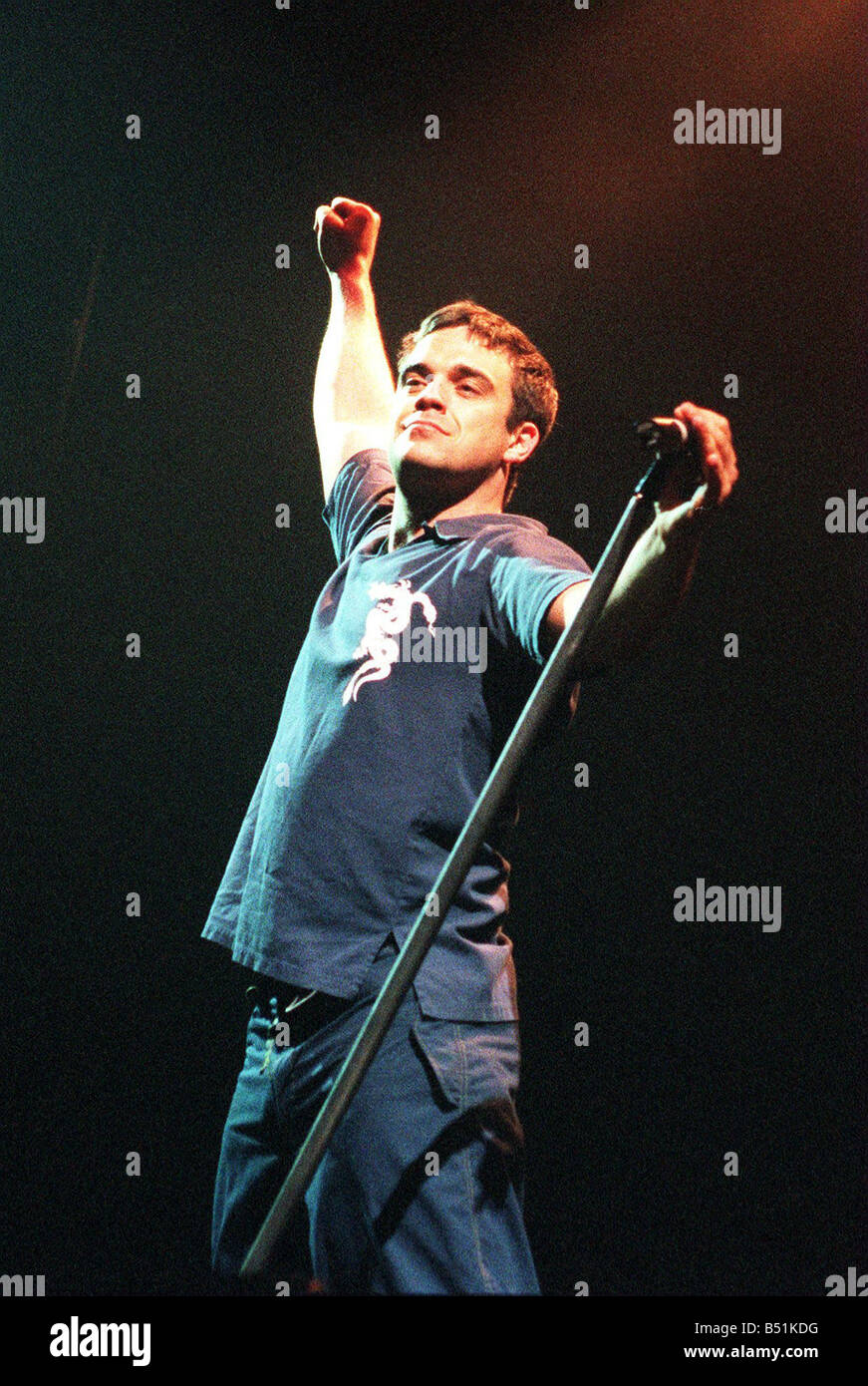 Robbie Williams singer on stage in Glasgow Stock Photo - Alamy
