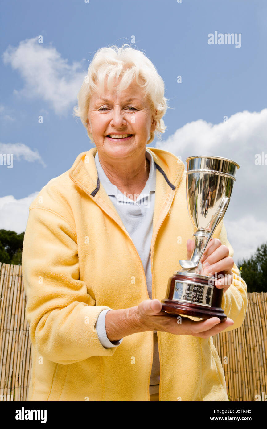 Woman Holding Trophy Stock Photo - Alamy Woman Holding Trophy Stock Photo - Alamy