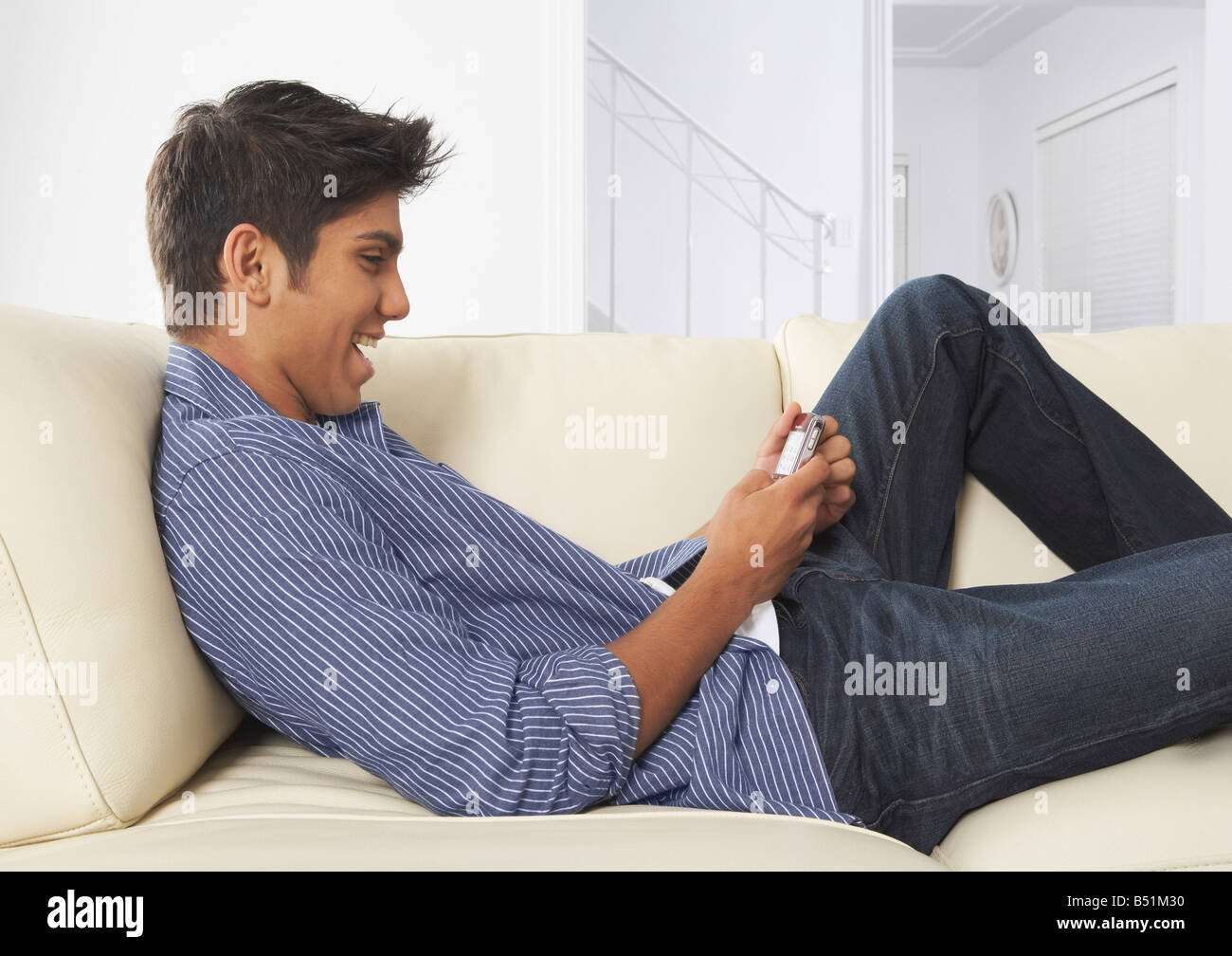 Teen Boy Laughing High Resolution Stock Photography and Images - Alamy