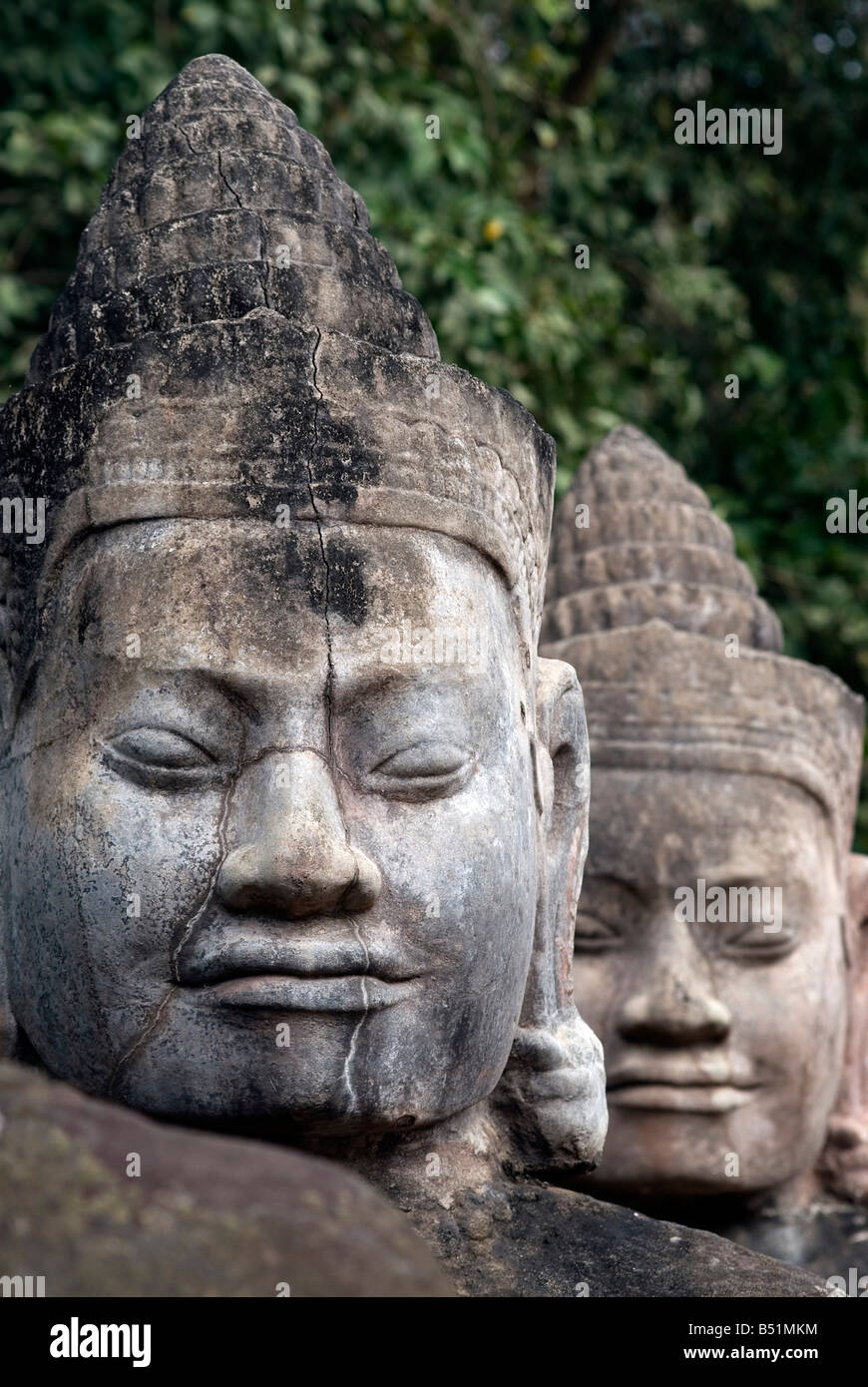 Two Temple Statues at the Entrance of Angkor Wat Stock Photo - Alamy
