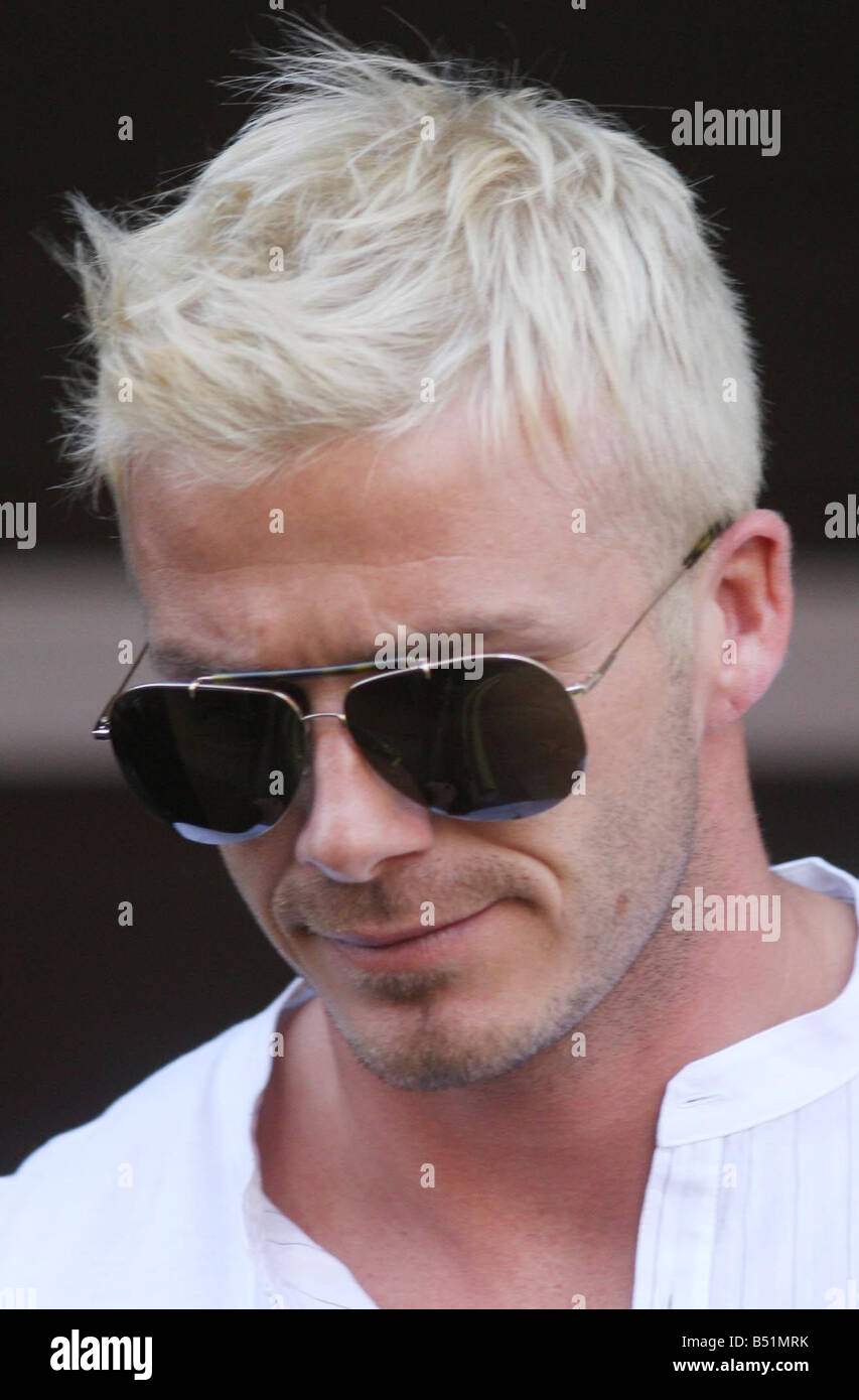 Birthday boy David Beckham and wife Victoria go shopping on London's ...