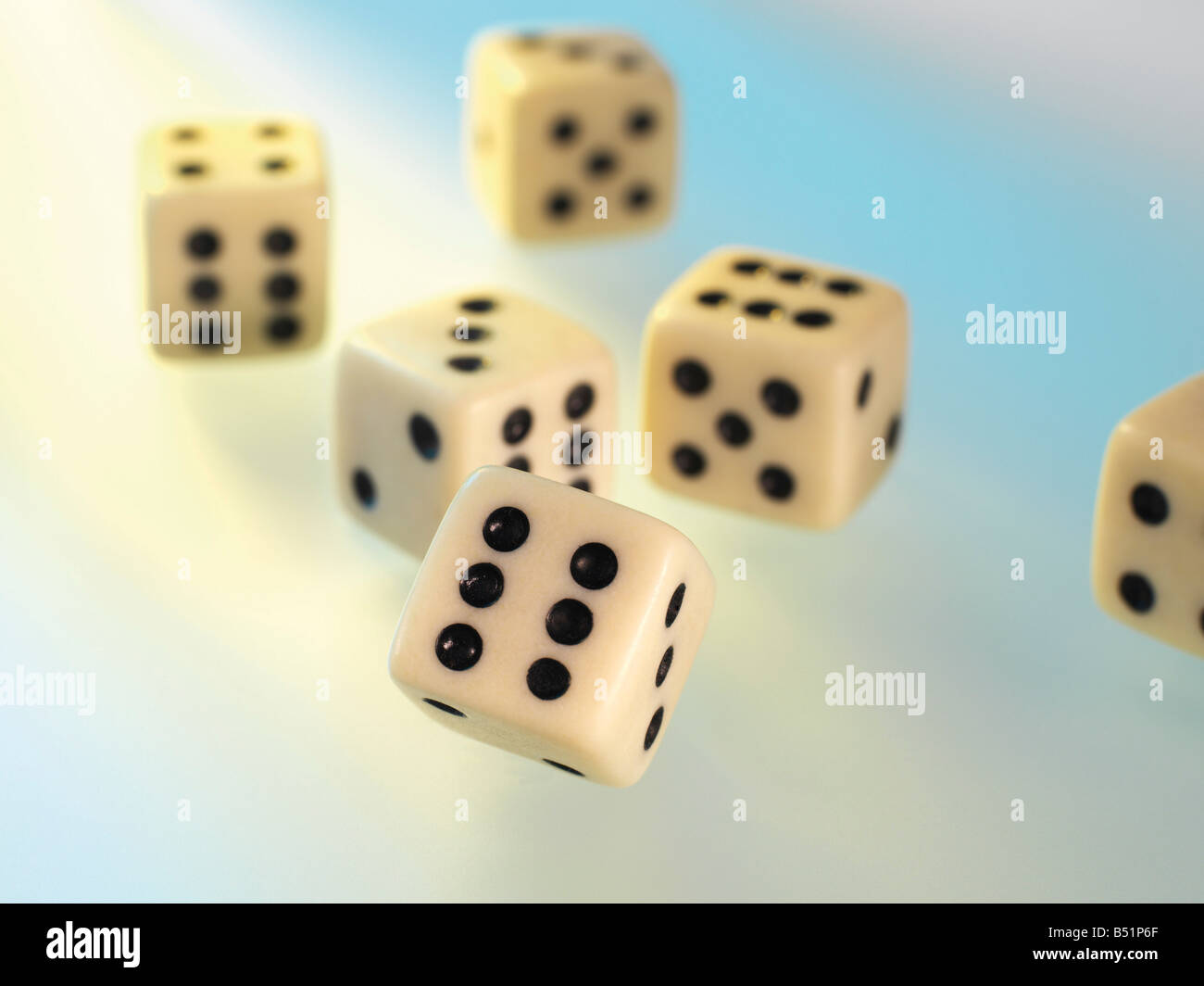 Six Die on Blue and Yellow Background Stock Photo - Alamy