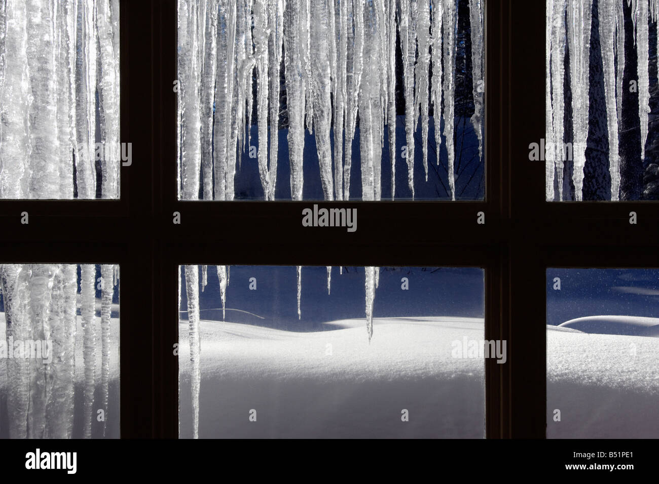 Icicles in Window Stock Photo - Alamy