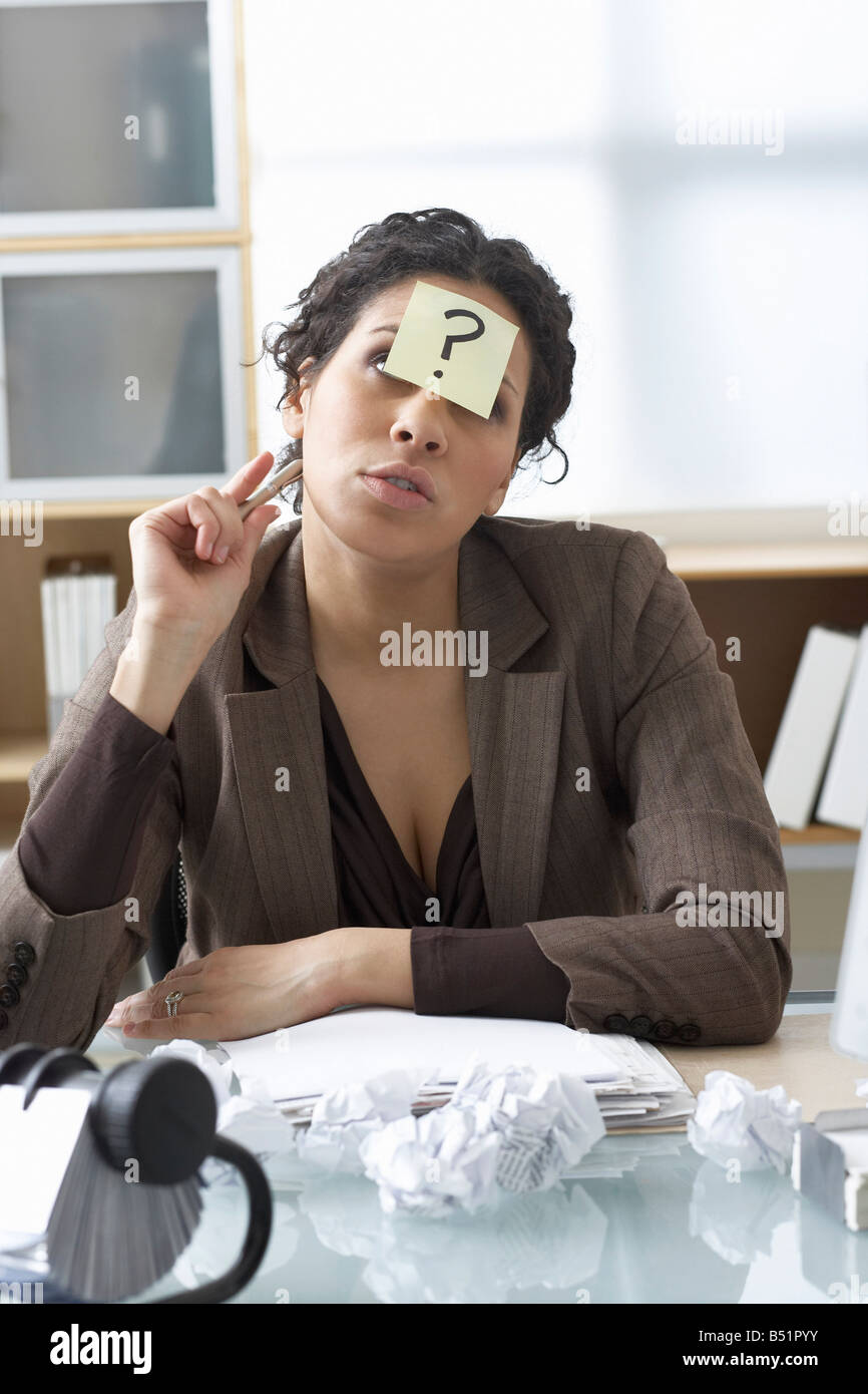 Confused thinking woman pencil hi-res stock photography and images - Alamy