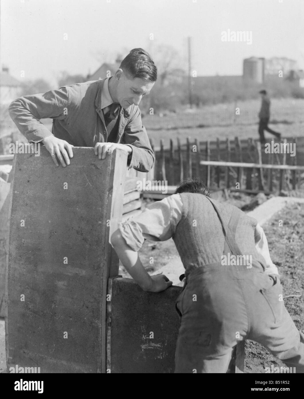 Sir Richard Acland, MP helps to build Labour Meeting Hall, Chalk. 17/3 ...