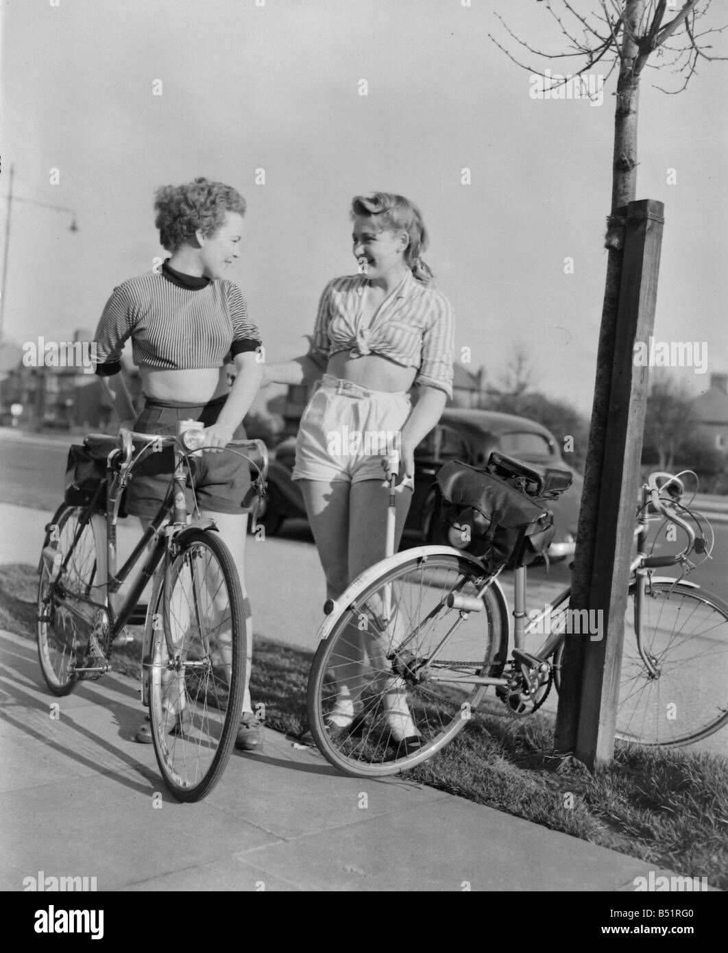 Girl bicycle 1950s hi-res stock photography and images - Alamy