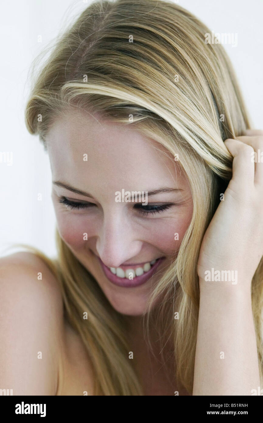 Woman blushing hands face hi-res stock photography and images - Alamy