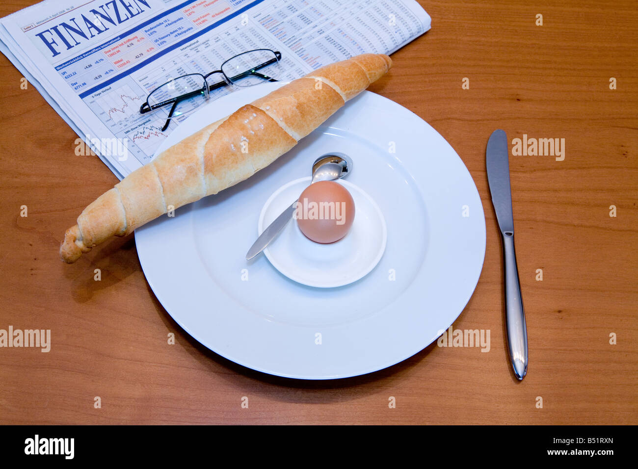 Breakfast with business newspaper Stock Photo - Alamy