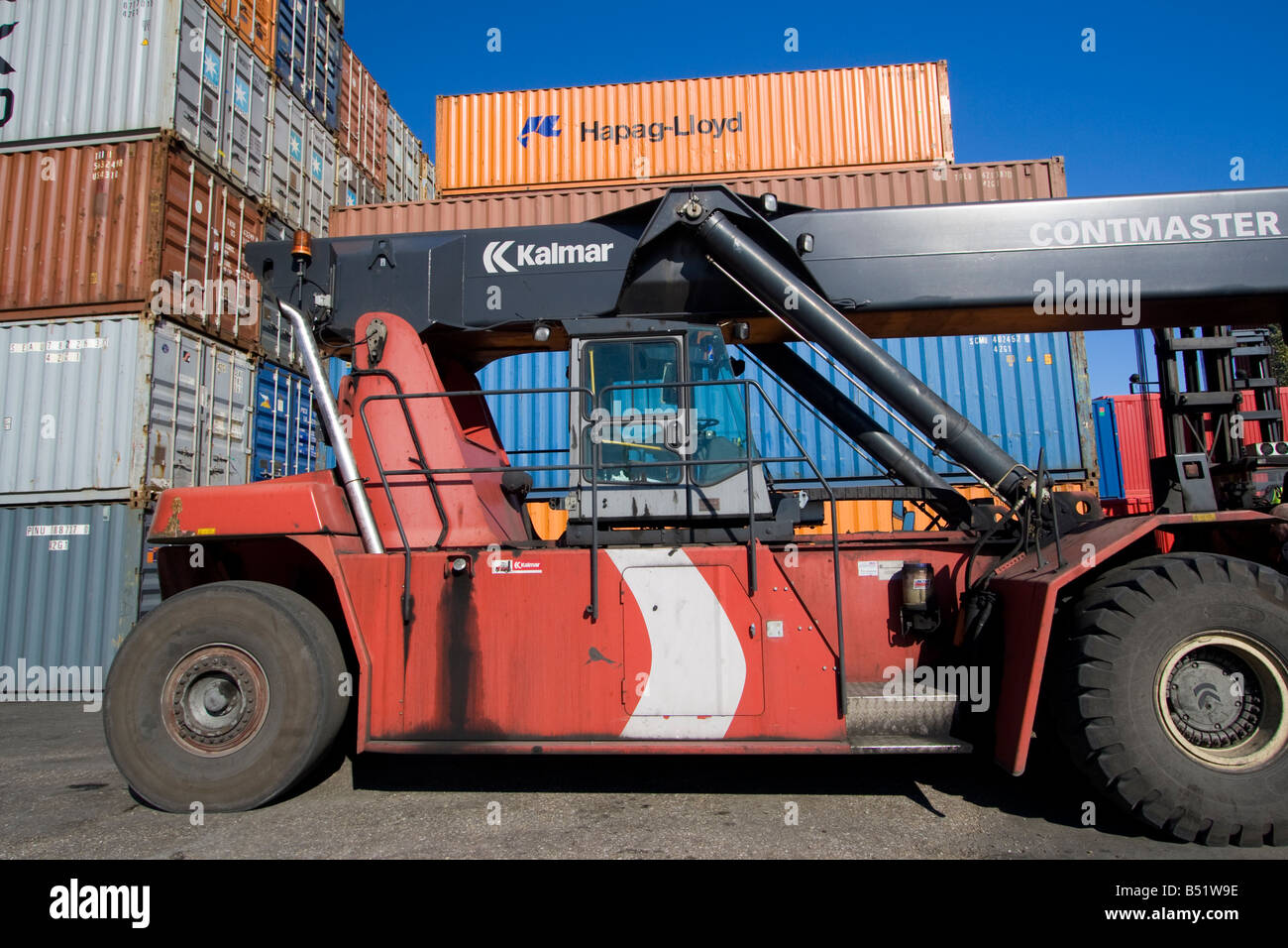 loading of containers at harbour Stock Photo - Alamy
