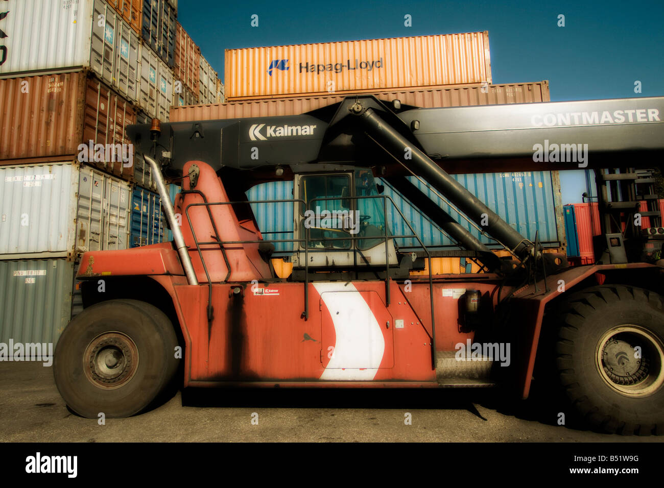 loading of containers at harbour Stock Photo - Alamy