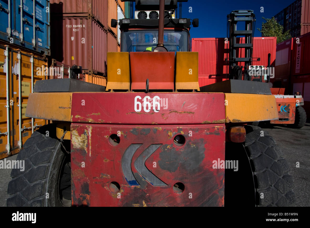 loading of containers at harbour Stock Photo - Alamy