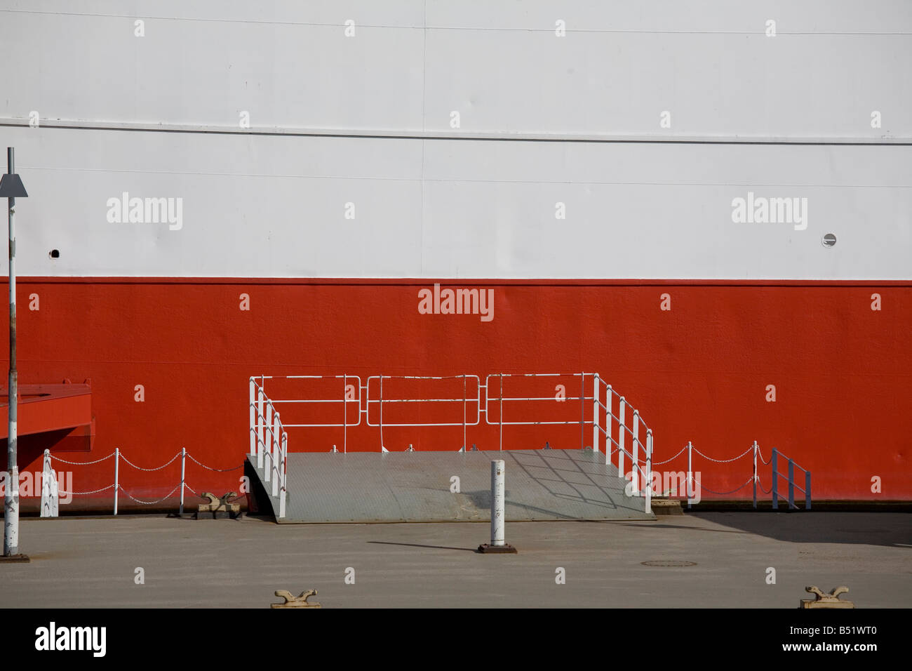Vessel wall with gangway Stock Photo - Alamy