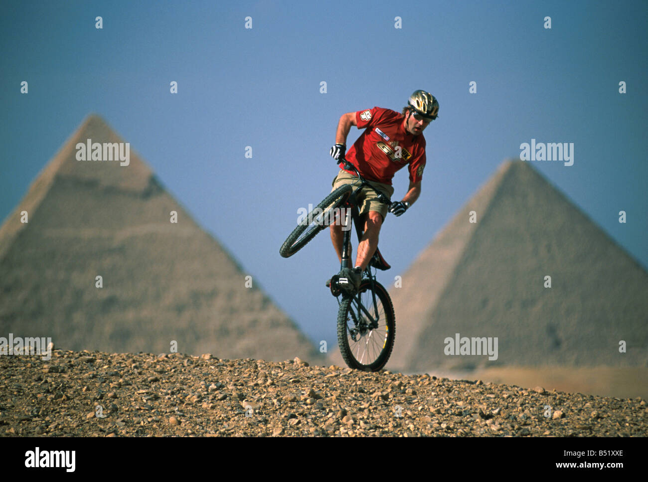 World Champion Hans Rey riding near the Pyramids of the Giza Plateau ...
