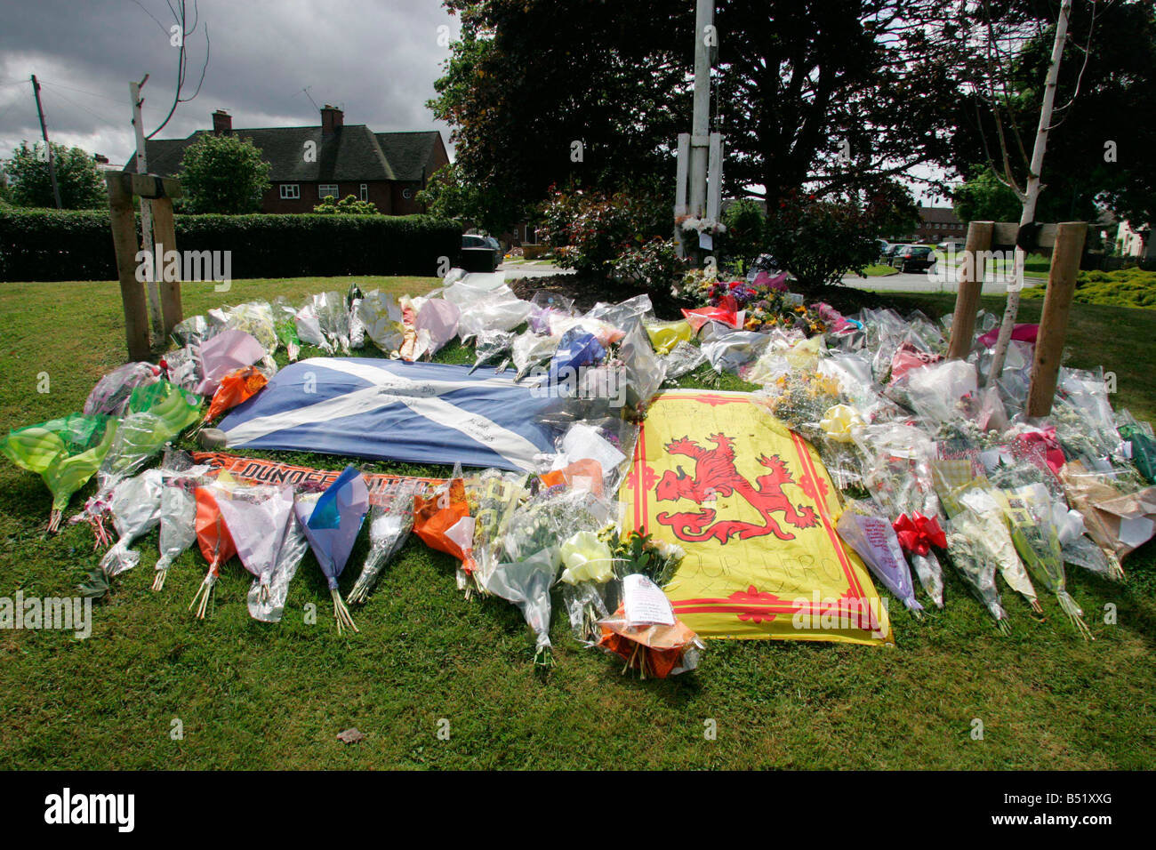 On the day of his funeral flowers left outside Police station in ...
