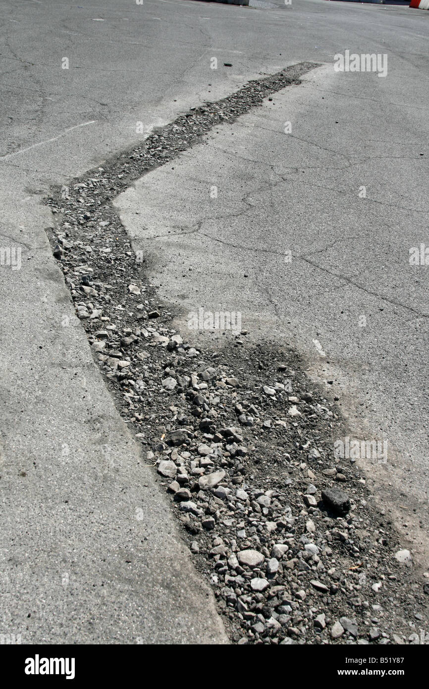 detail of finished road hole surface repair maintenance Stock Photo - Alamy