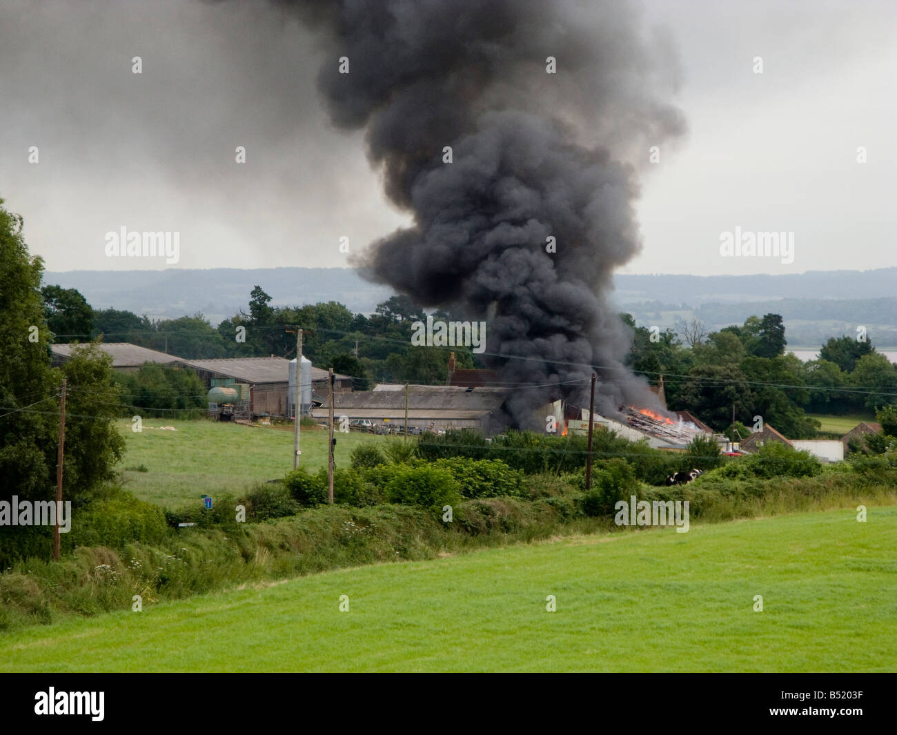 FIRE AND SMOKE IN BARN ON FARM GLOUCESTERSHIRE Stock Photo - Alamy