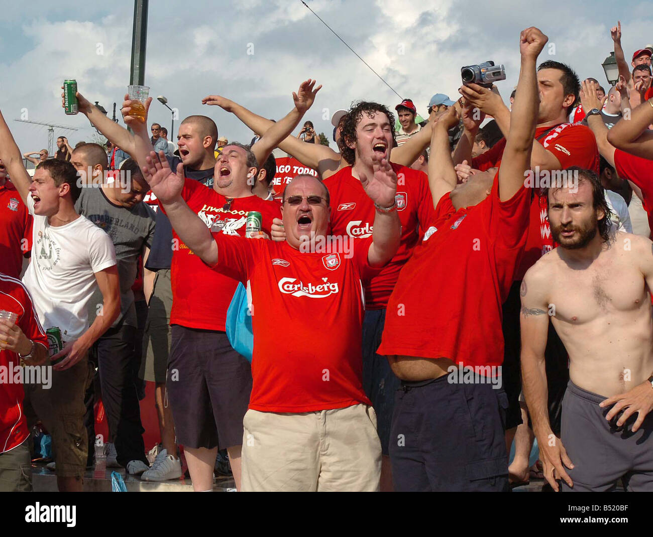 Fans singing in rain in constitution square hi-res stock photography ...
