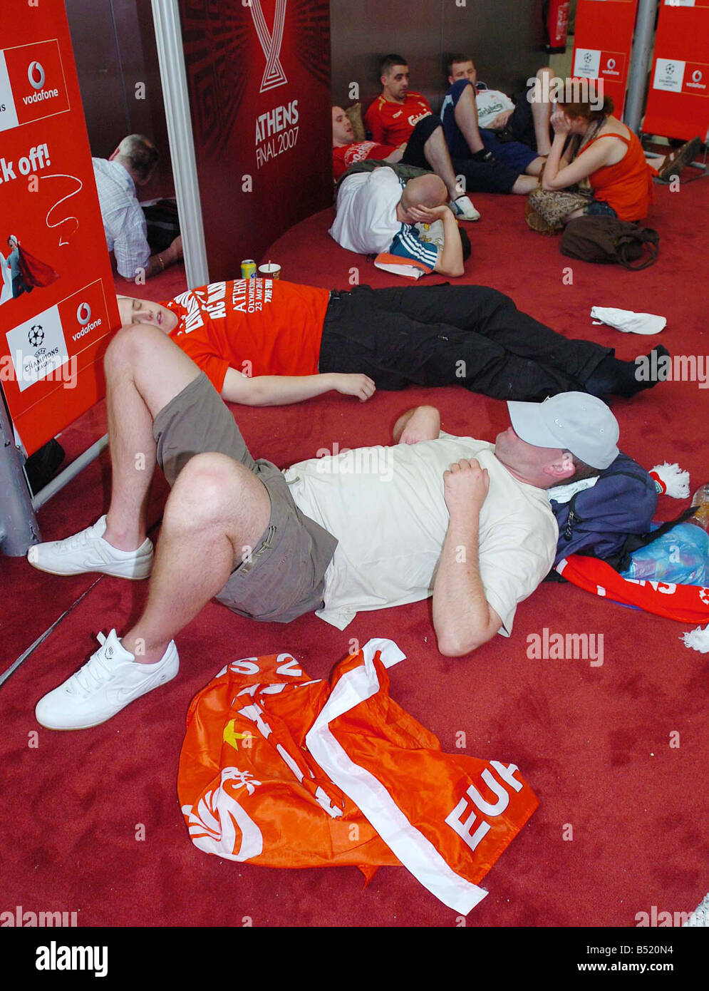 Sleepy Liverpool fans at Ahens Airport after the Champions league final ...