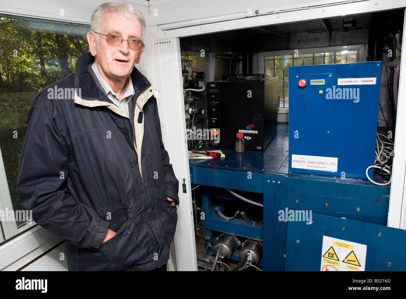 Professor Rex Harris who developed the boat is infront of the fuel ...