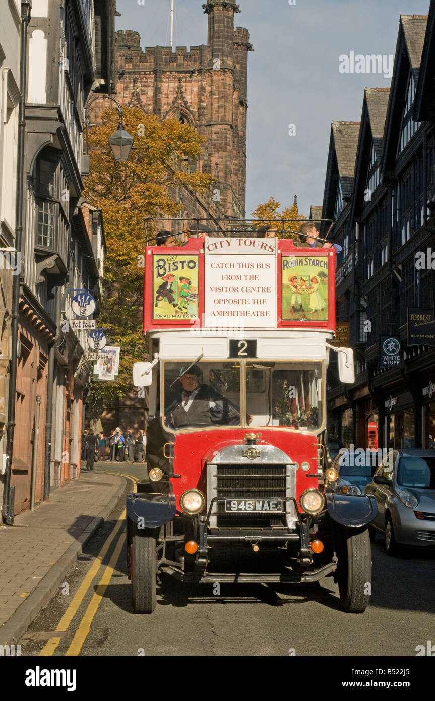 Old fashioned bus used to show visitors and tourists around Chester ...