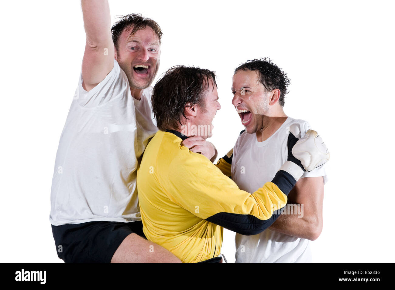 Happy soccer team Full isolated studio picture Stock Photo - Alamy