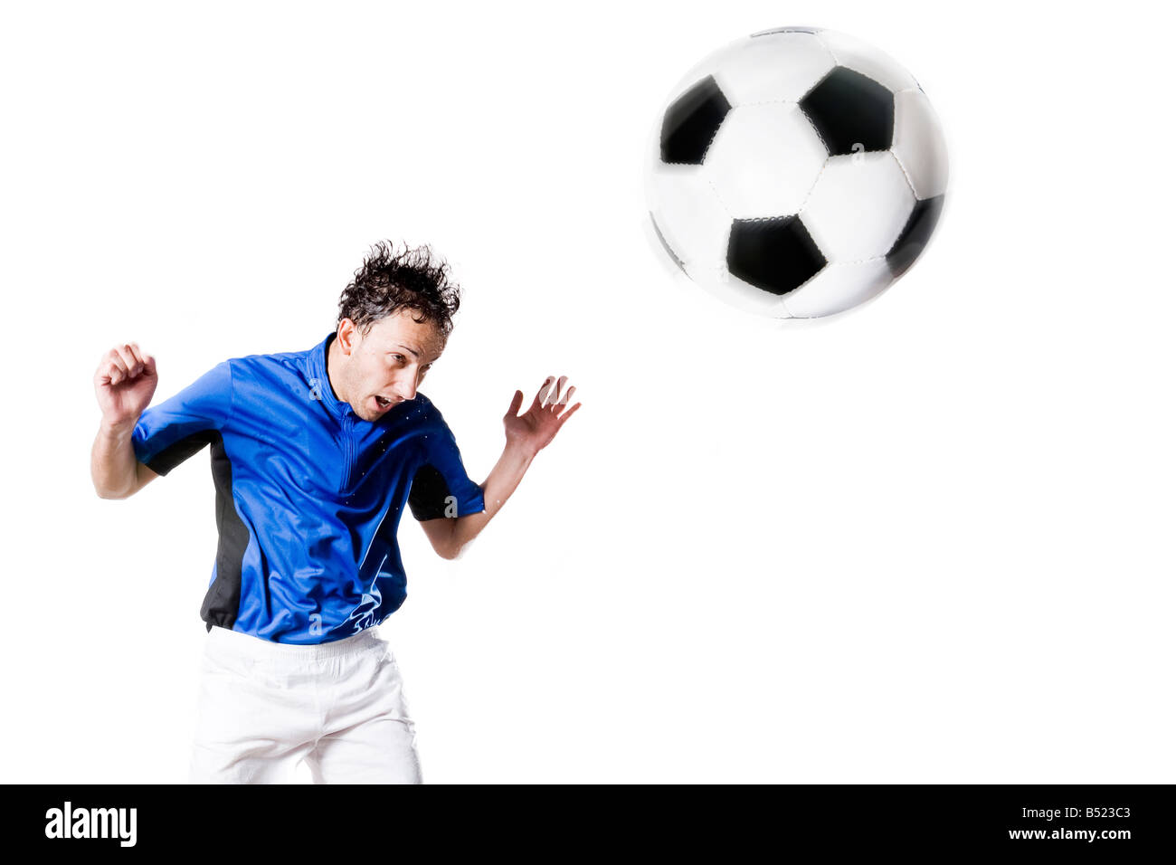 Soccer player in action Full isolted studio picture Stock Photo - Alamy