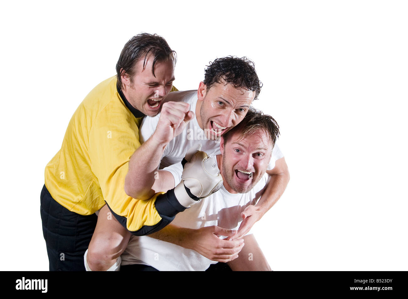 Happy soccer team Full isolated studio picture Stock Photo - Alamy