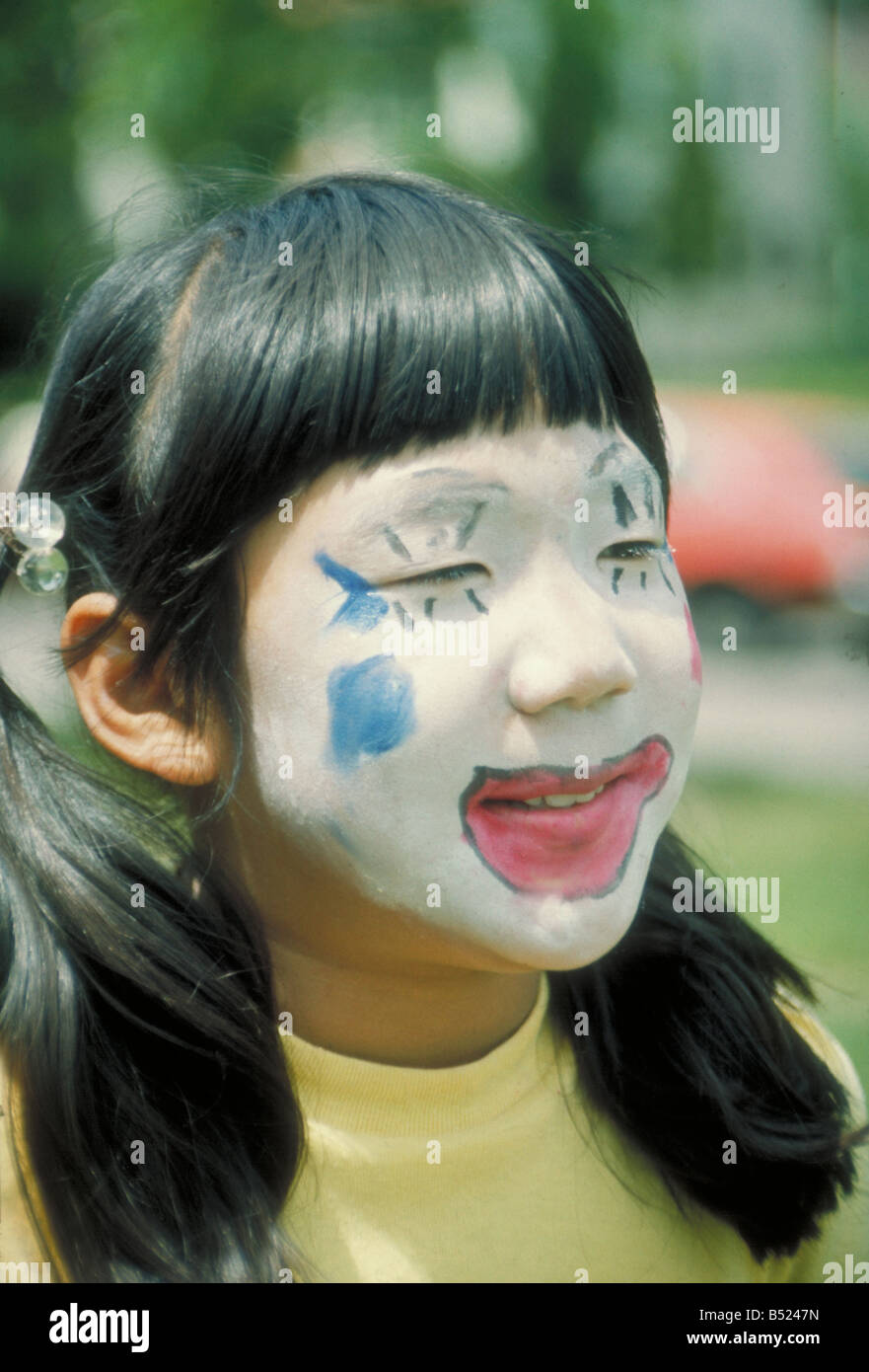 Asian girl in clown face makeup. St. Paul, Minnesota Stock Photo - Alamy