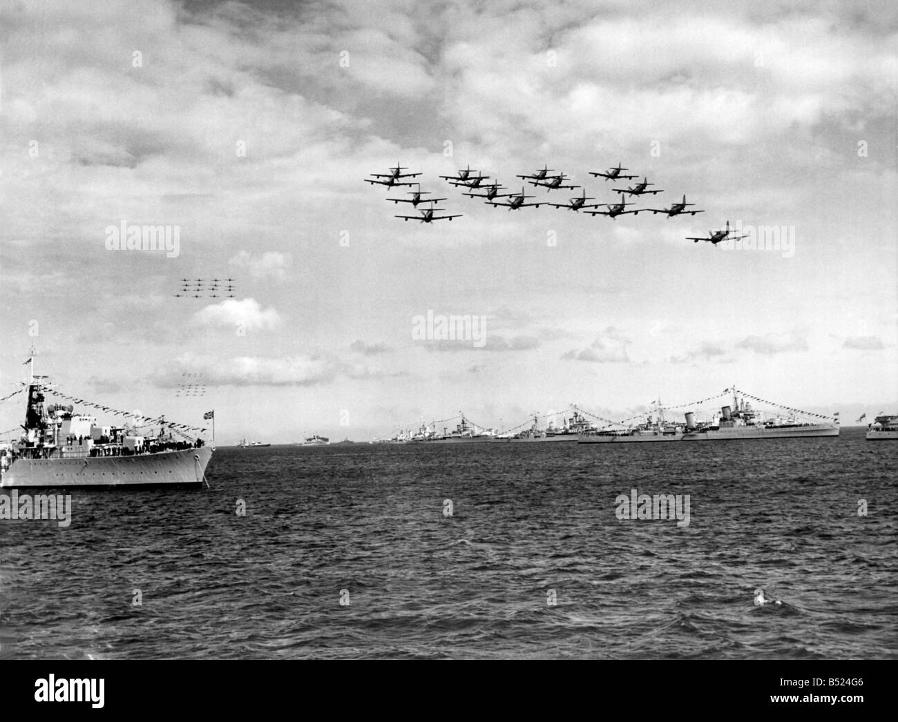 Royal Navy Fairey Firefly aircraft passing over the fleet during the ...