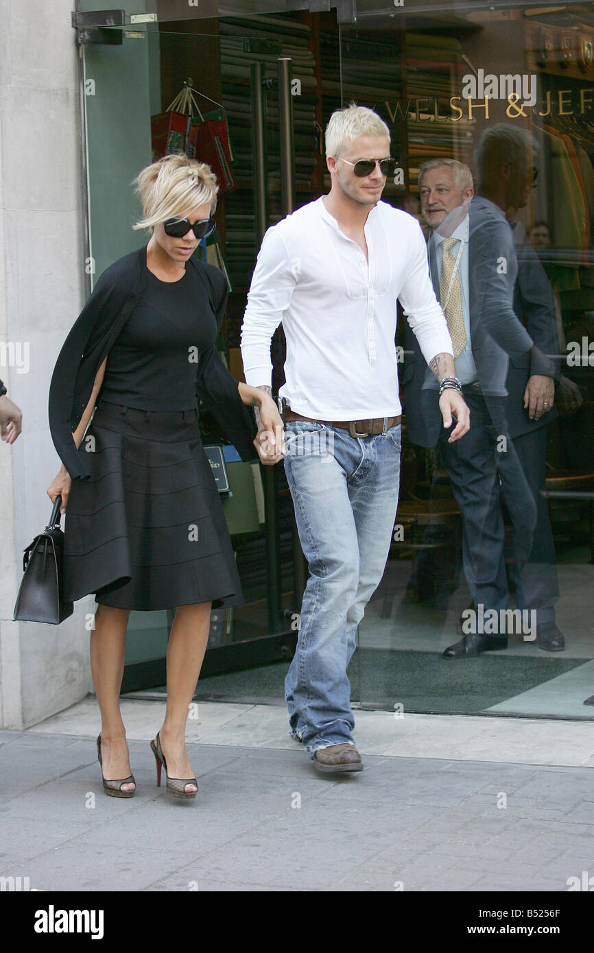 02 05 07 VICTORIA AND DAVID BECKHAM IN SAVILE ROW LONDON PHOTO PHIL ...
