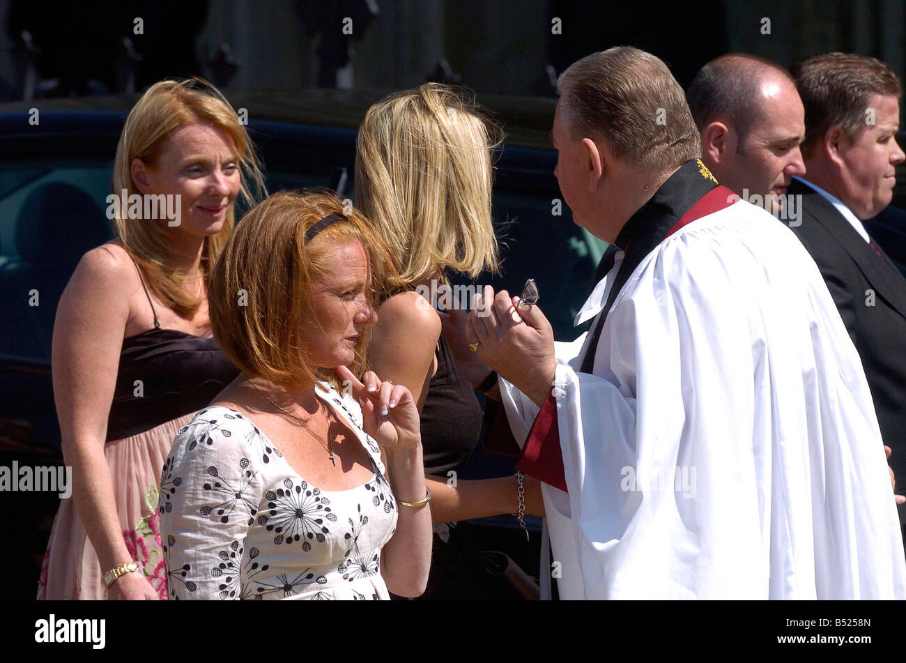 Alan Ball funeral, Winchester cathedral. Daughters arrive Stock Photo ...