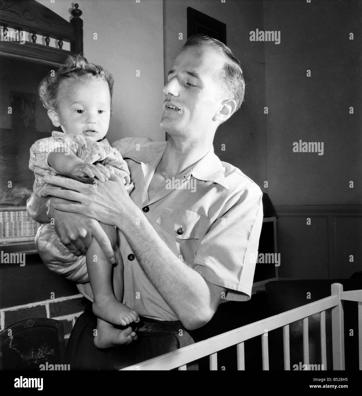 1950s father and baby hi-res stock photography and images - Alamy