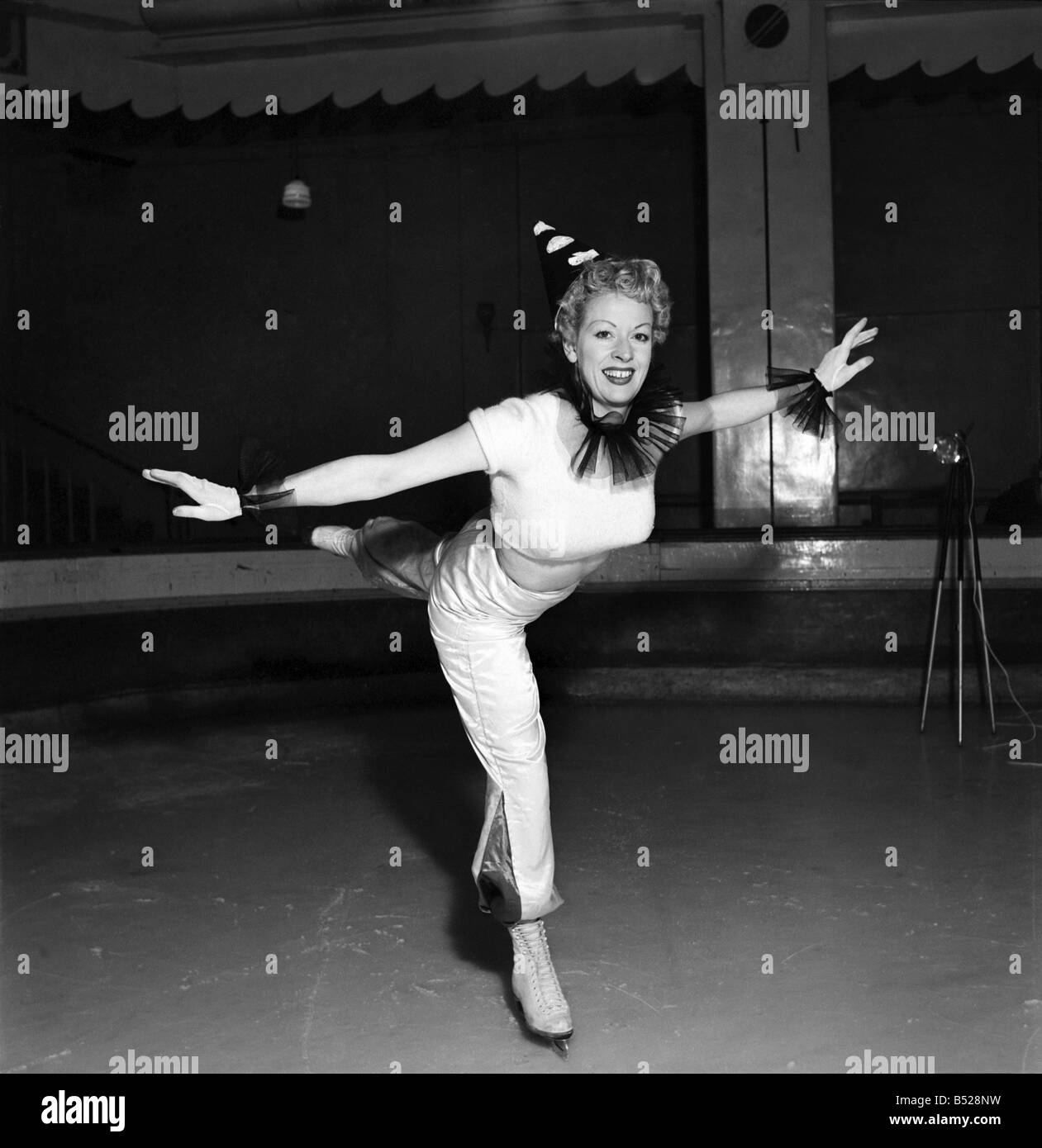An Ice Skating female Clown performing . January 1953 D597-001 Stock ...