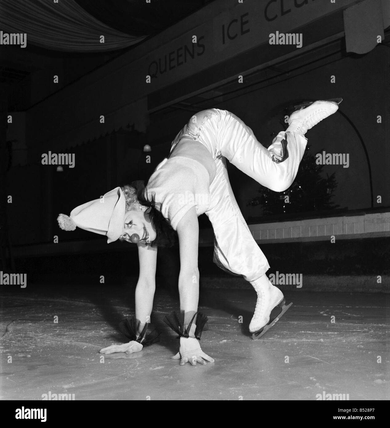An Ice Skating female Clown performing . January 1953 D597-006 Stock ...