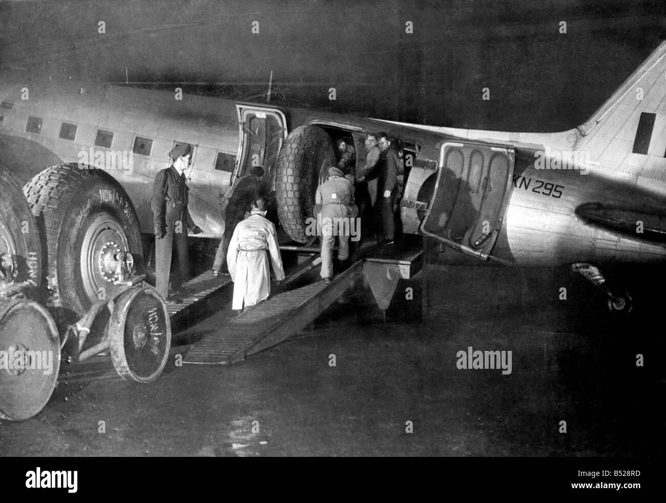 Goods loaded onto a British aircraft for the Berlin Air Lift during the ...