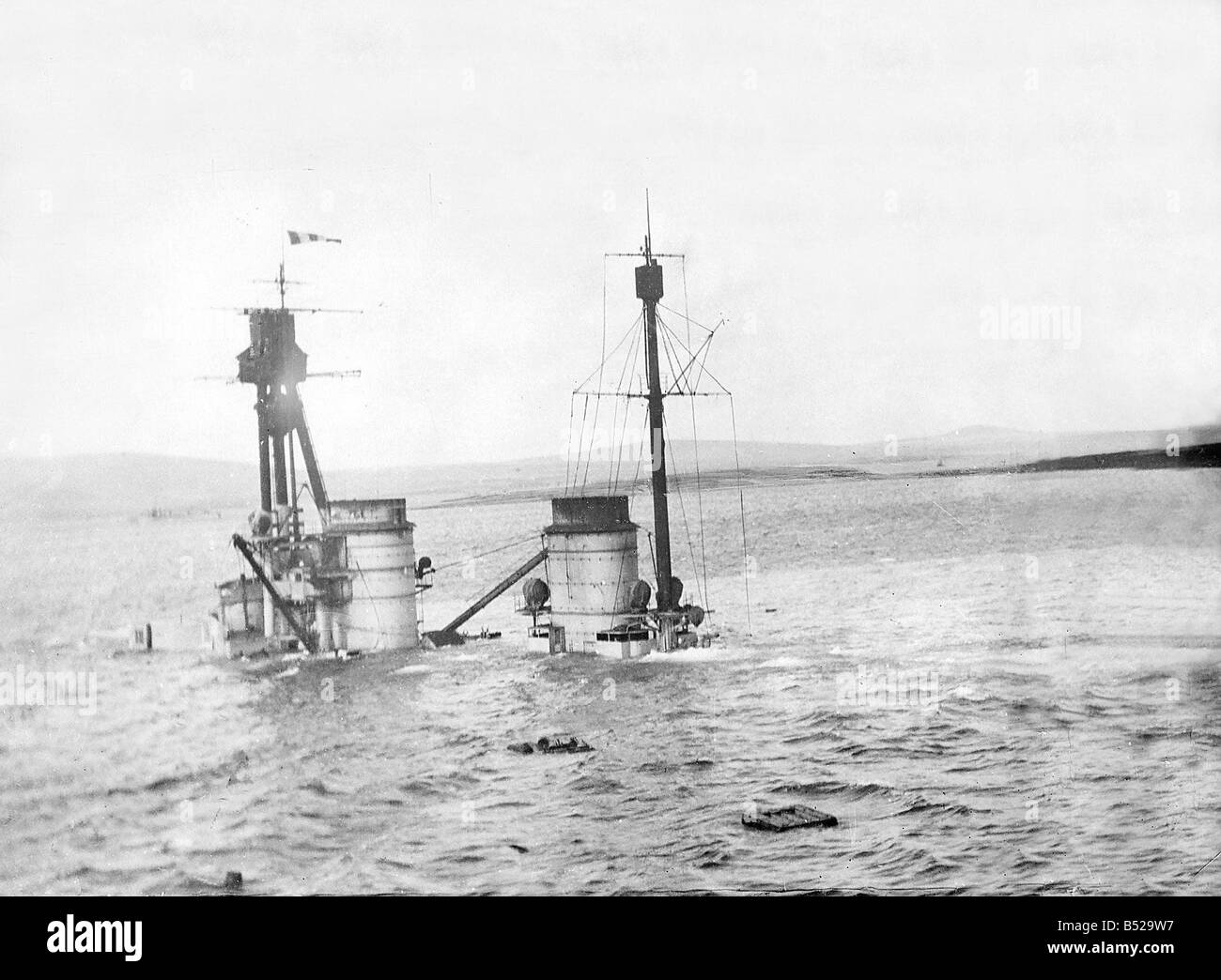 Scuttled German fleet sinks into sea at scapa Flow WWI in Scotland in ...