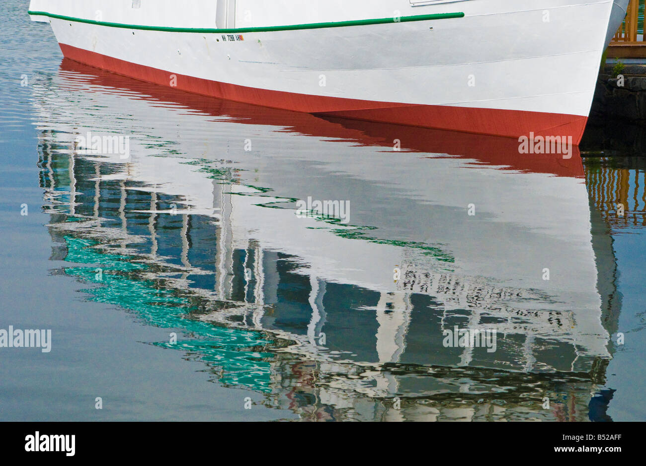 Boat reflection in water Stock Photo - Alamy