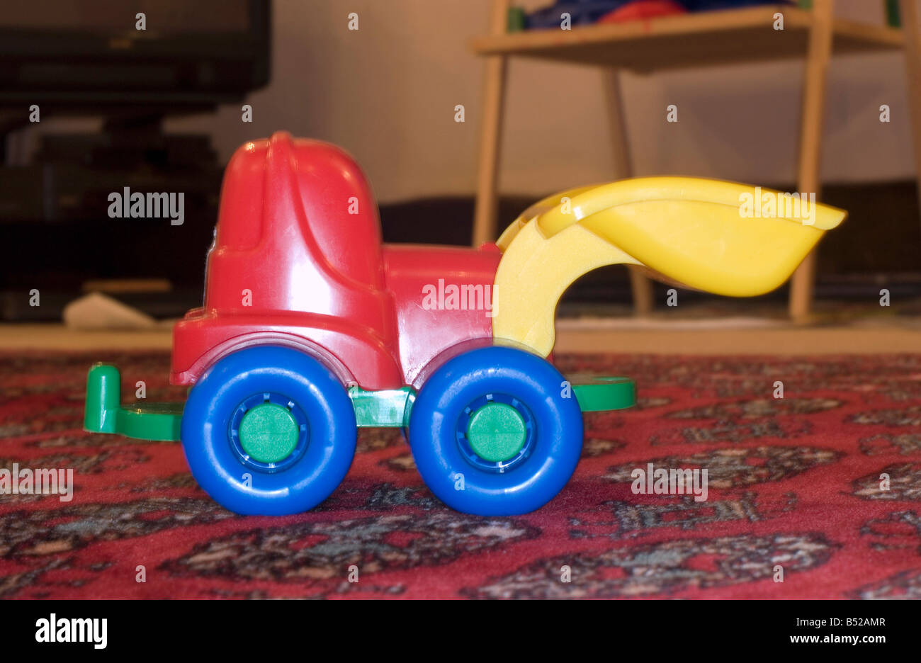 Toy plastic digger truck hi-res stock photography and images - Alamy