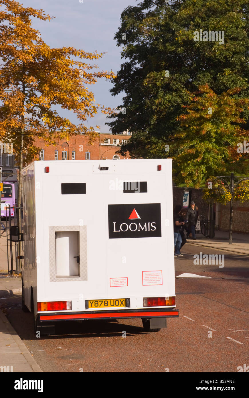 Loomis security van in uk street Stock Photo - Alamy