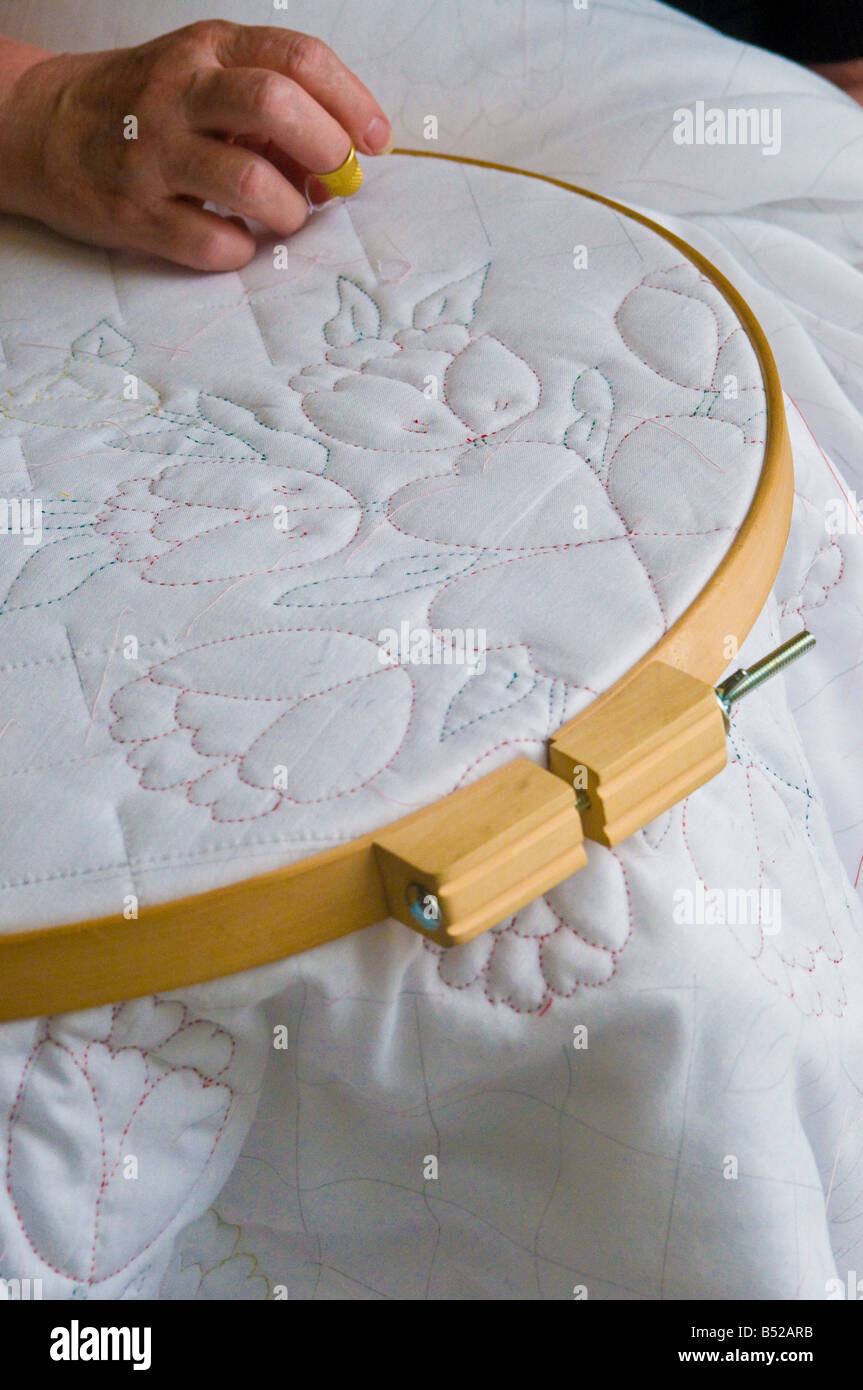 close up womans hands sewing Stock Photo - Alamy