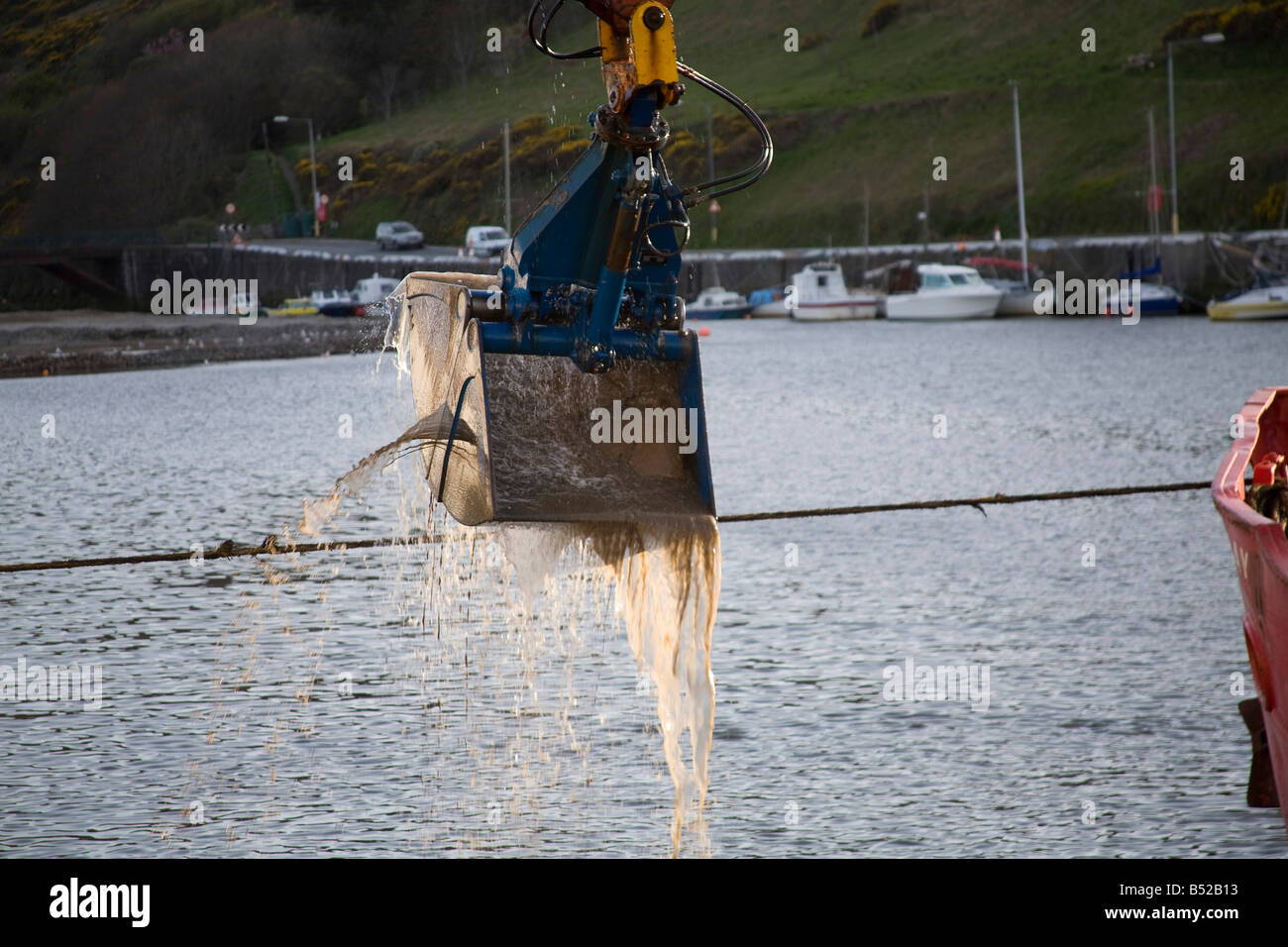 Dipper Dredger in action, Close up bucket. Peel harbour Isle of Man ...