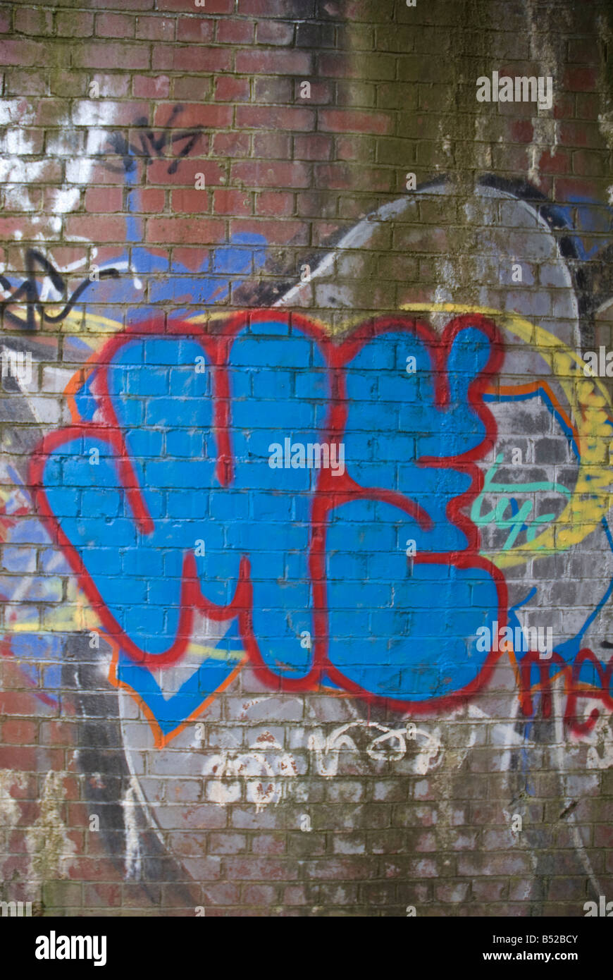 Graffiti under a railway bridge Stock Photo - Alamy
