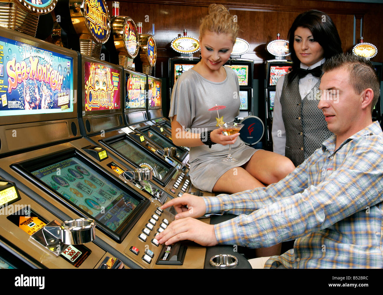 casino slot machine gamblers woman female girl boy man people betting ...