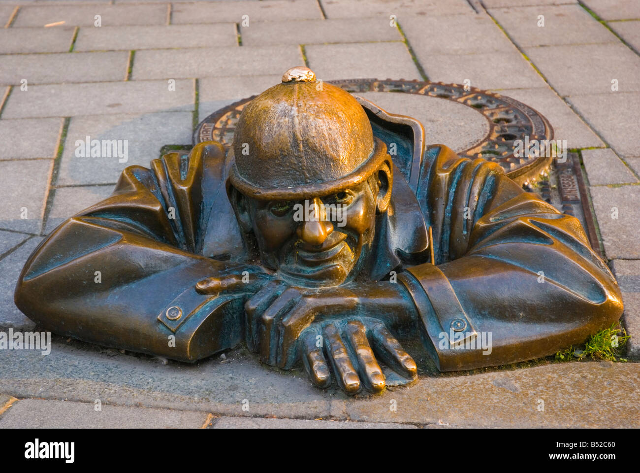 Man at Work statue in old town Bratislava Slovakia Europe Stock Photo ...