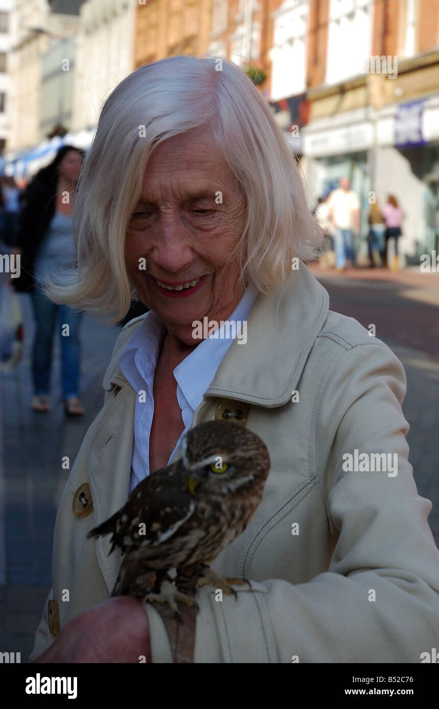screech owl with lady pensioner Stock Photo - Alamy